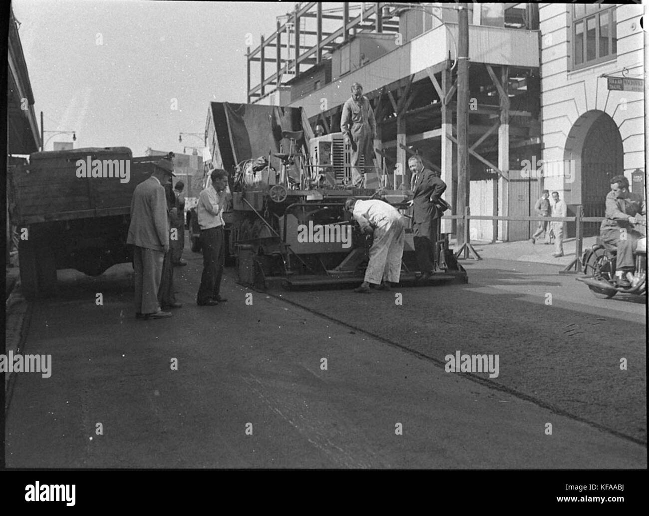 41372 Tar paving machine Newcastle City Engineer Mr Baddeley right ...