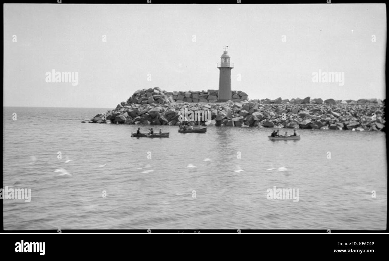 This image captures the entrance to Fremantle Harbour, an important ...