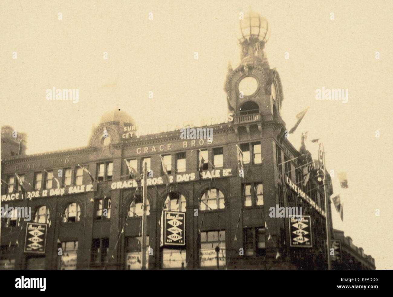 Advertising signs promoting Grace Bros' 12 Days Sale, showcasing retail ...