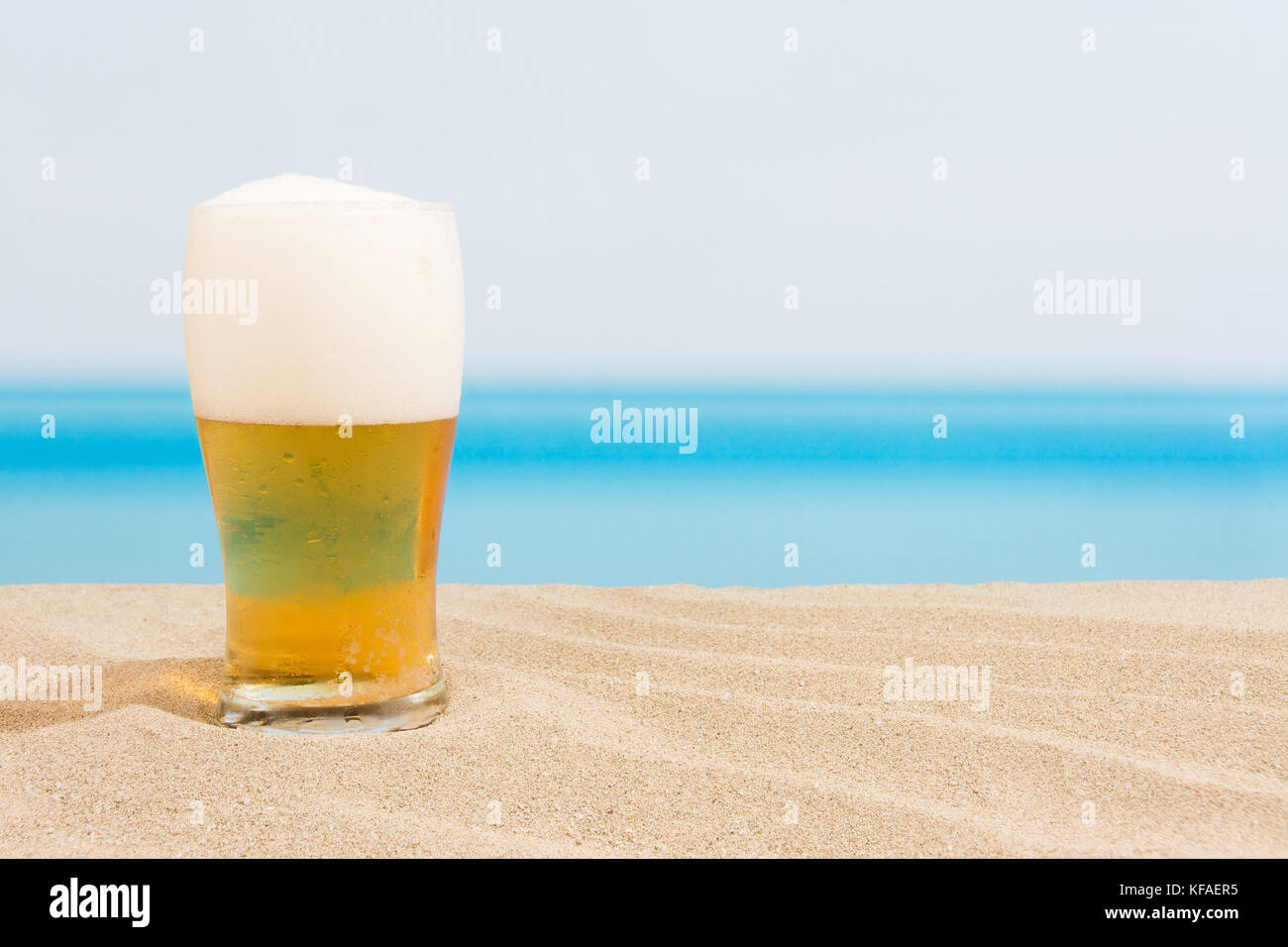 Beer on the beach Stock Photo - Alamy