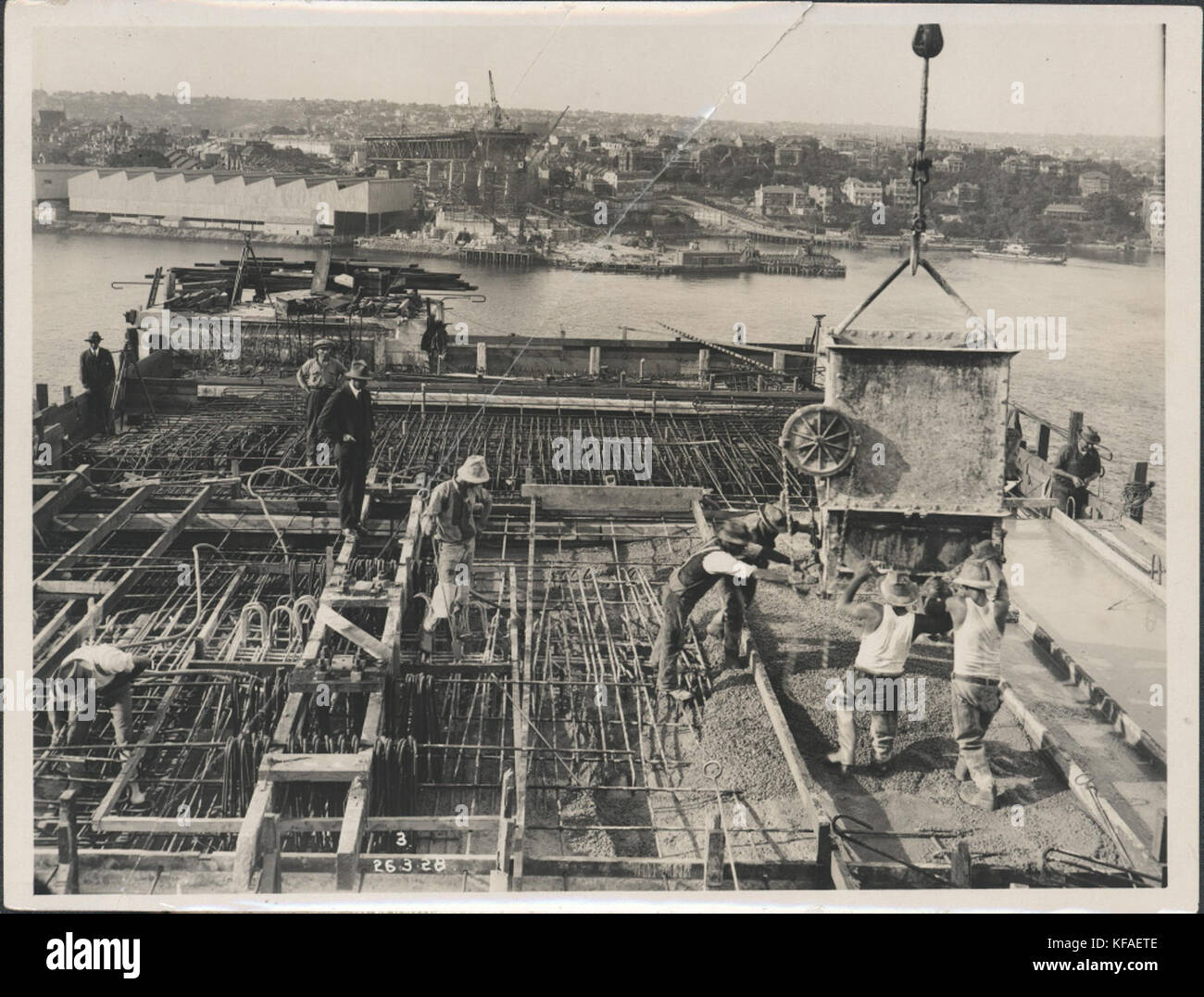 Pouring concrete on the southern platform of the Sydney Harbour Bridge ...
