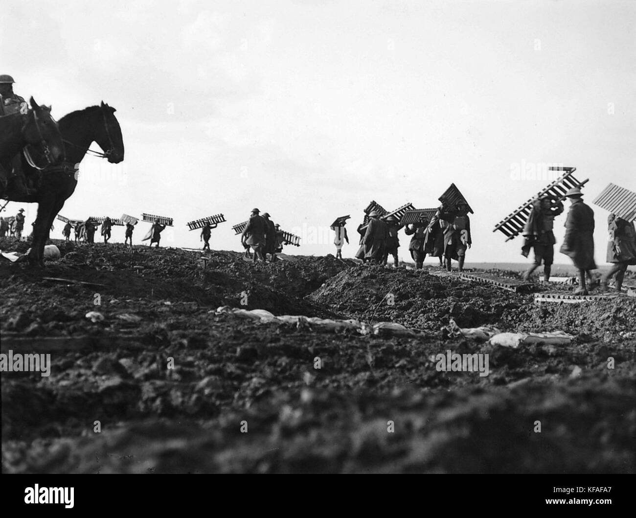 1st Division laying duckboards over the muddy ground in Passchendaele ...