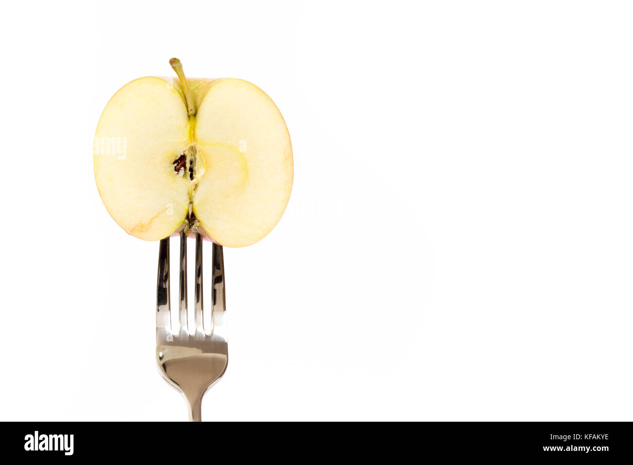 Concept of vegetarian food. Apple on fork Stock Photo - Alamy