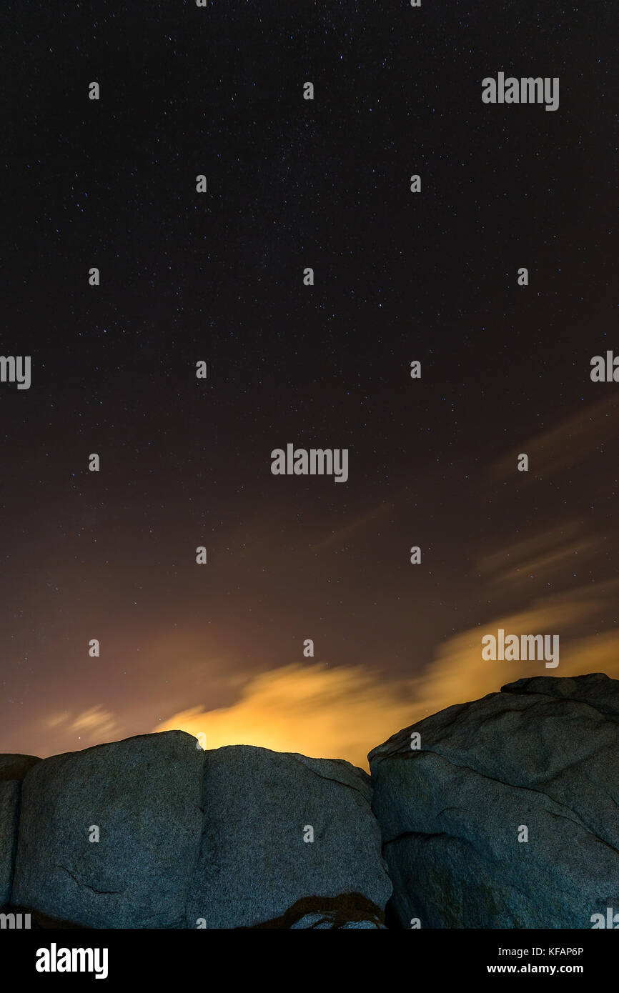 Night scene with rocks and stars Stock Photo - Alamy