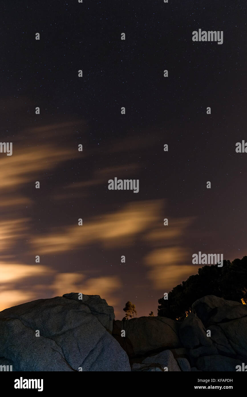 Night scene with rocks and stars Stock Photo - Alamy