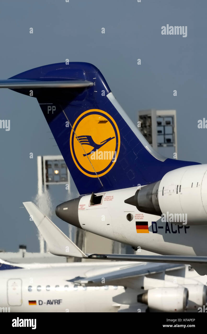 CRJ tail with logo, winglets and engines passing Terminal1 with a ...