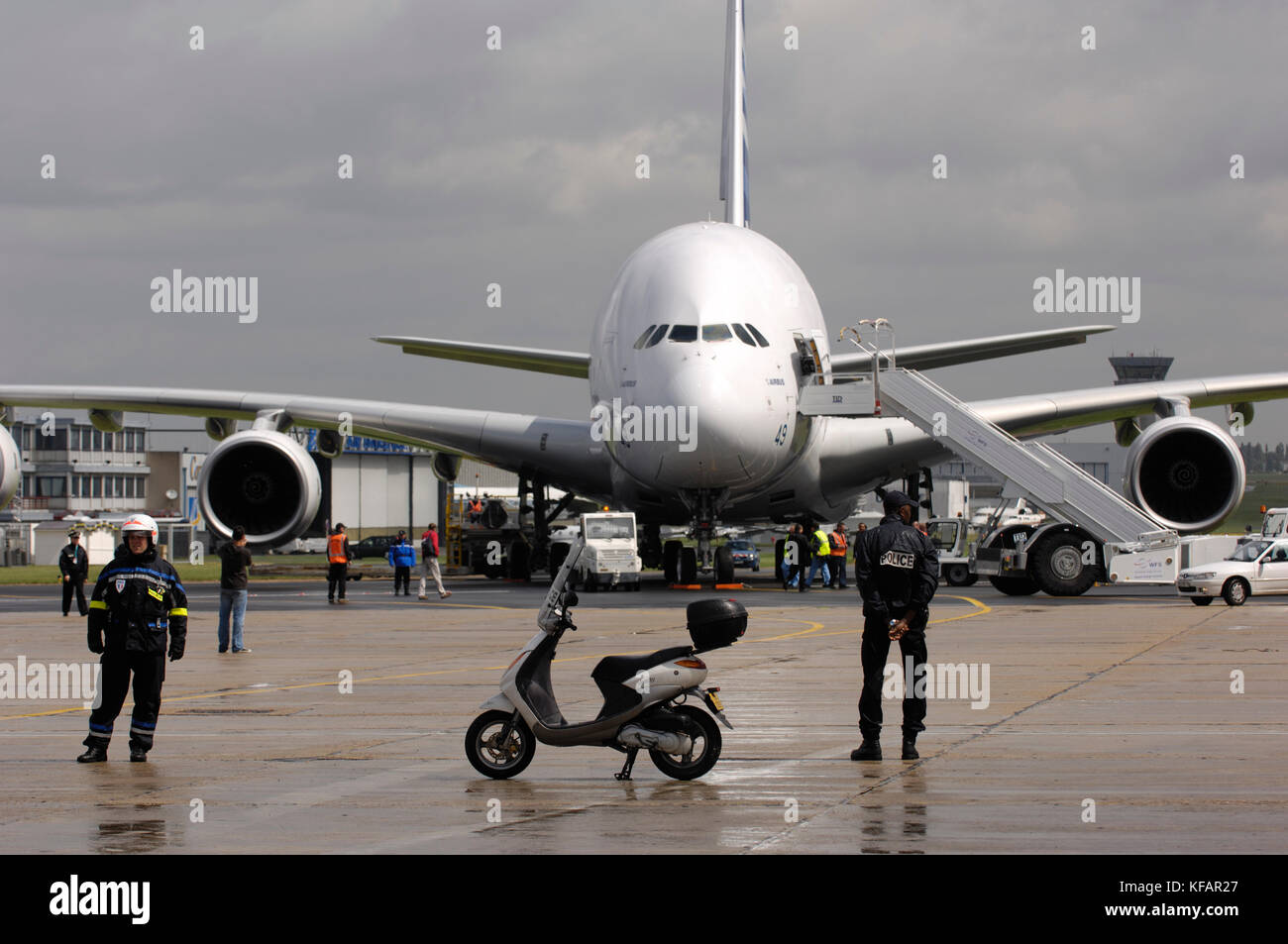 police in the front of the Airbus A380-841 parked at the Paris AirShow ...