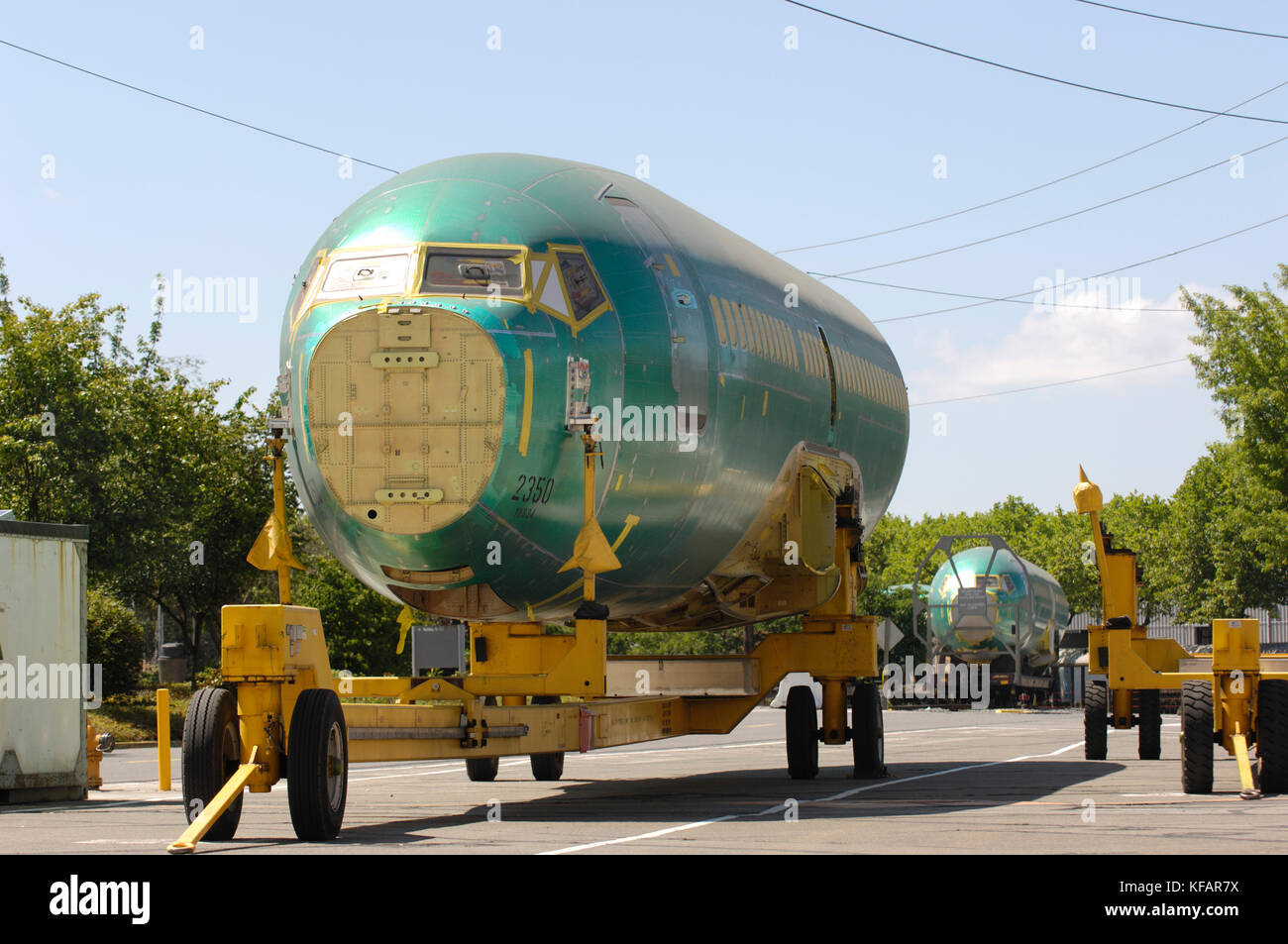 a fuselage section of a Boeing 737-700 (LN2350) on a trolley with ...
