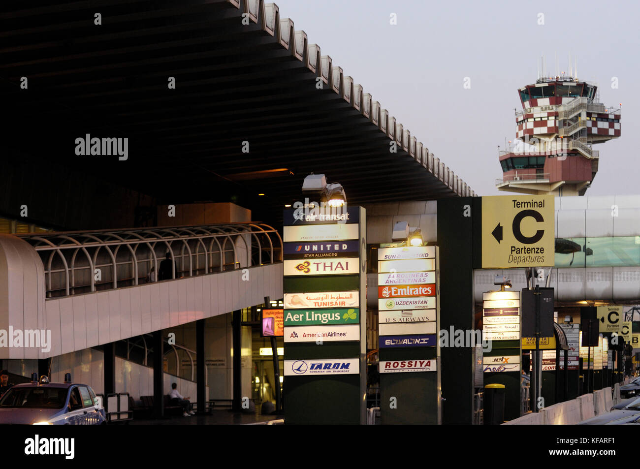 signs for airlines, TerminalB and TerminalC in English and the Italian ...