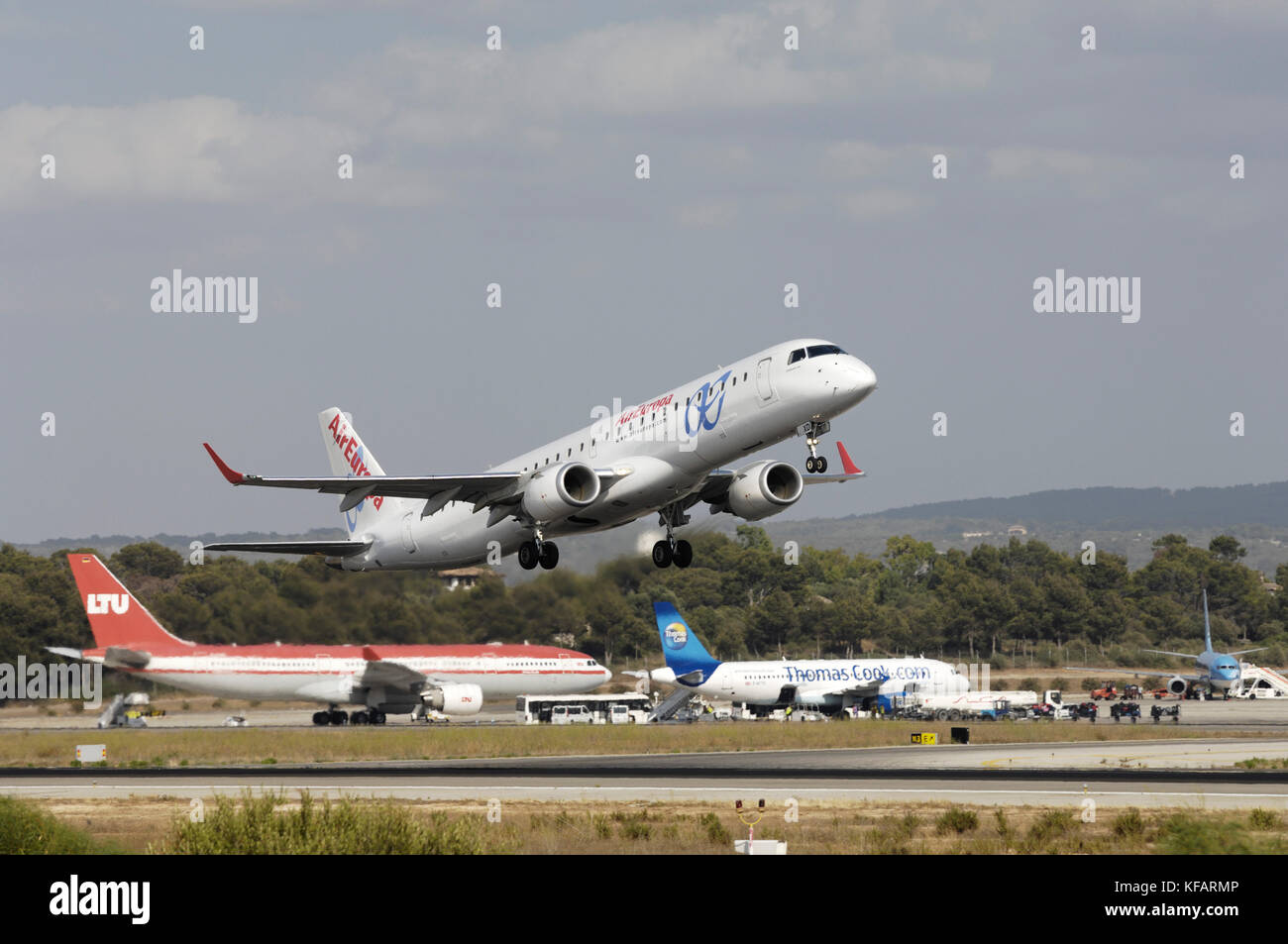 Air Europa Embraer 195 taking-off with LTU Airbus A330 and Thomas Cook ...