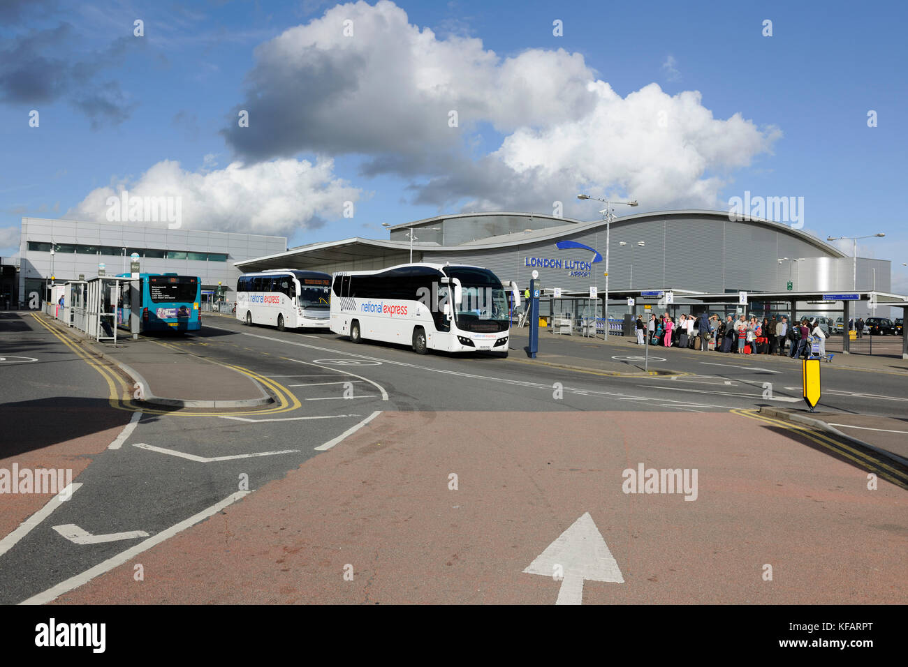 two National Express coaches parked in front of the Terminal at Luton ...