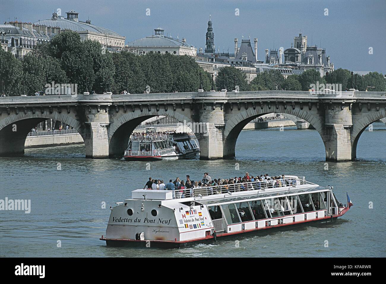France, Ile-de-France, Paris. Bateau Mouche along the Seine River Stock ...