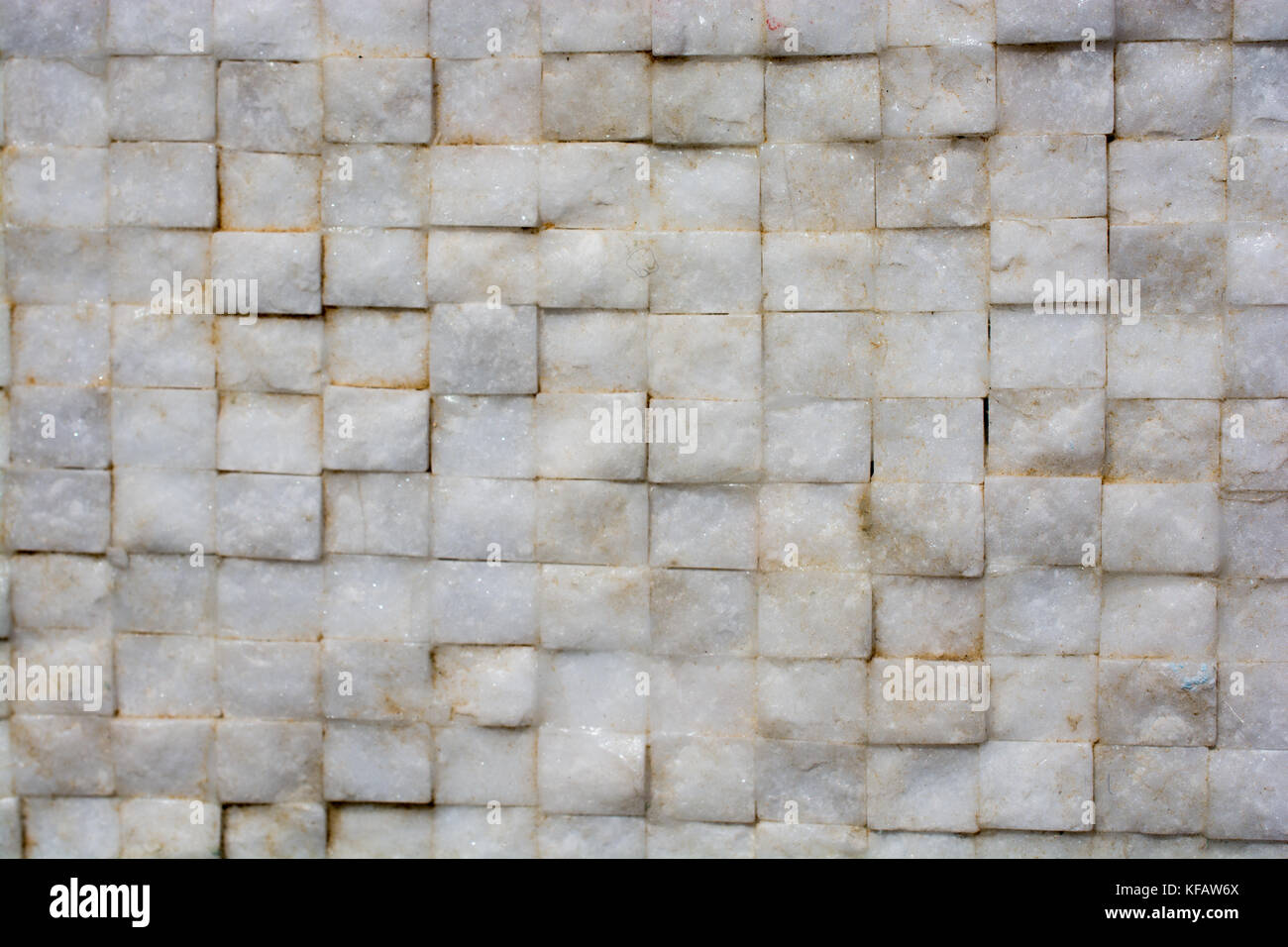 Decorative cubic stone wall as background texture Stock Photo - Alamy