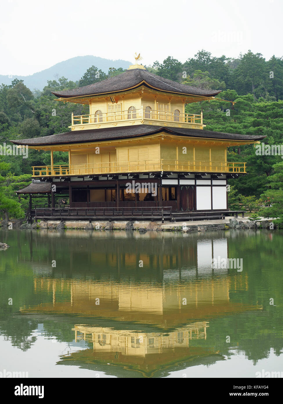View of the Kinkaku-ji temple aka Golden Pavilion reflected in the ...