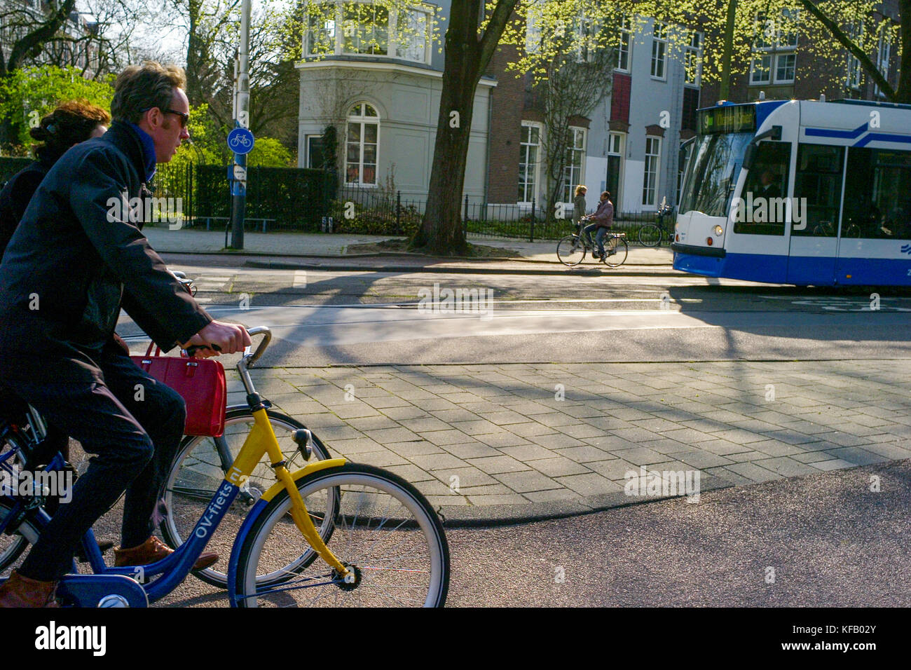 Bicycle riding in Amsterdam, Netherlands Stock Photo - Alamy