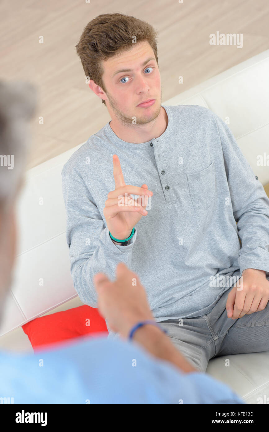 telling a joke Stock Photo - Alamy