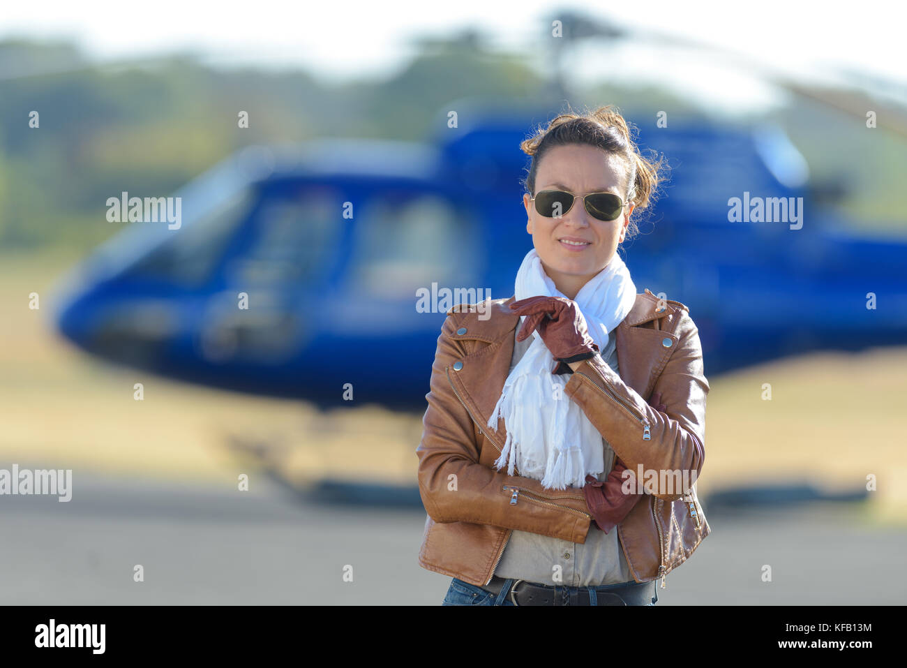 condident female helicopter pilot Stock Photo - Alamy