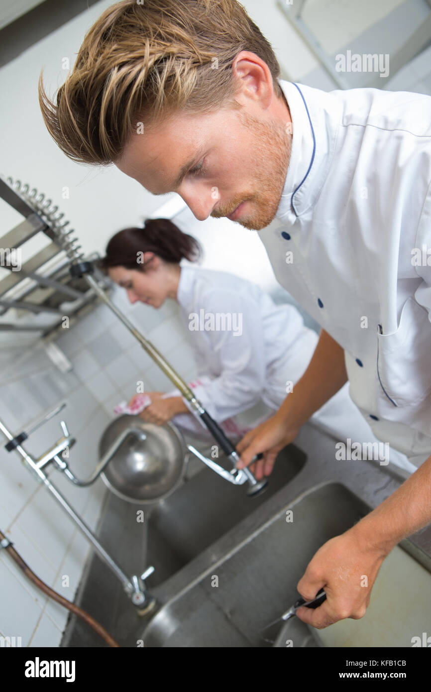 chefs washing utensils Stock Photo - Alamy