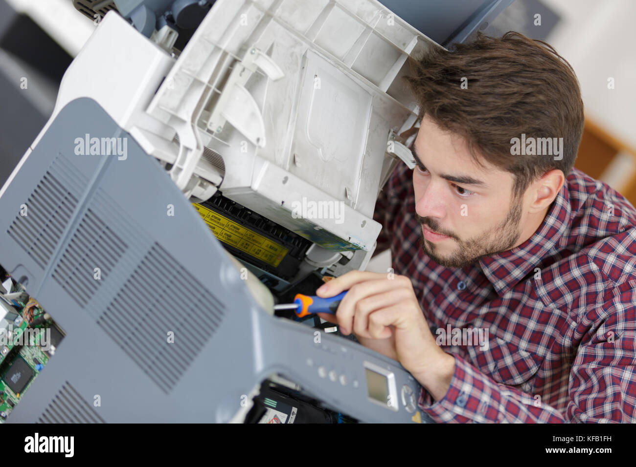 fixing a printer Stock Photo - Alamy