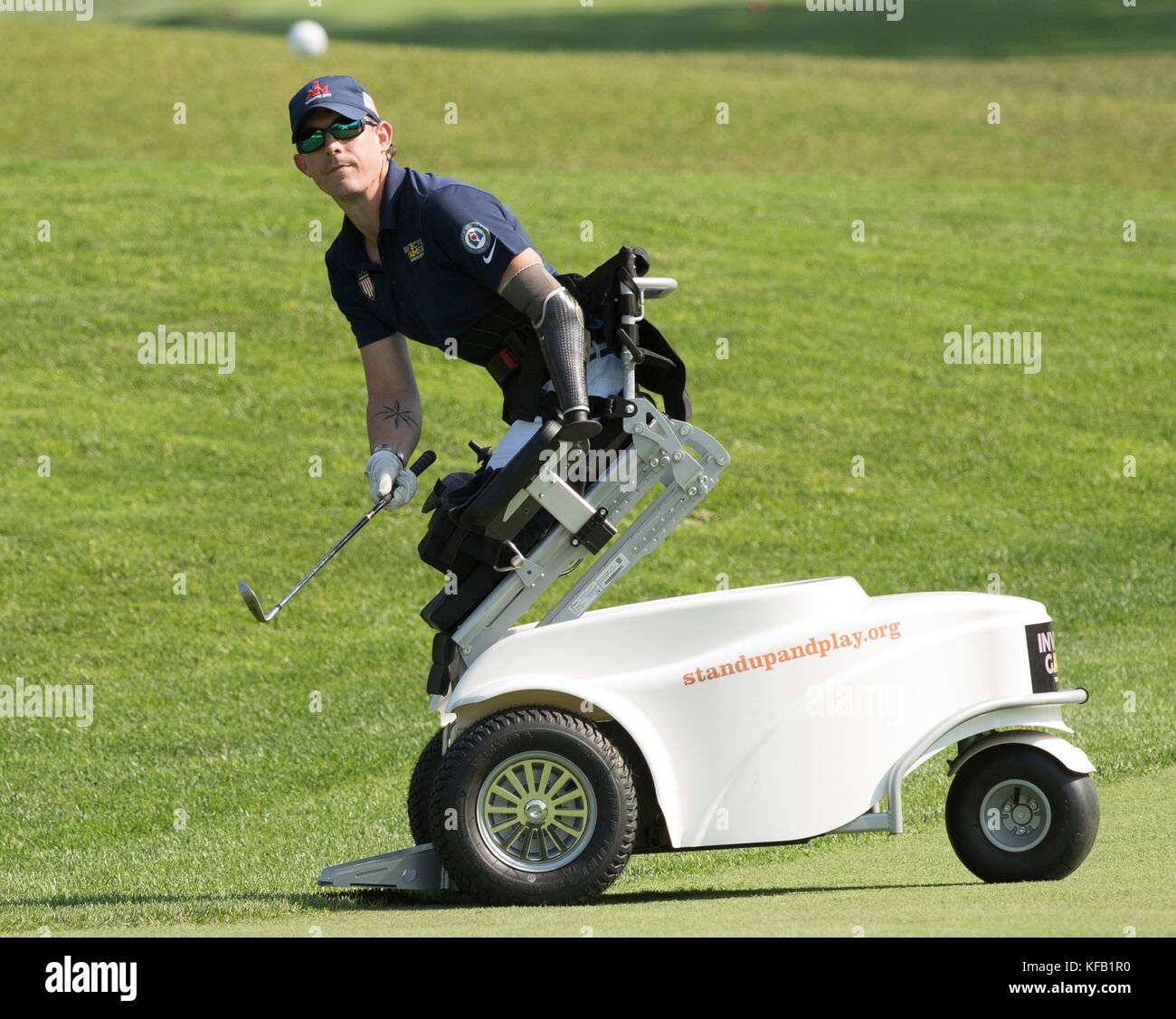 A U.S. Marine Corps veteran competes in a golf tournament at the St ...