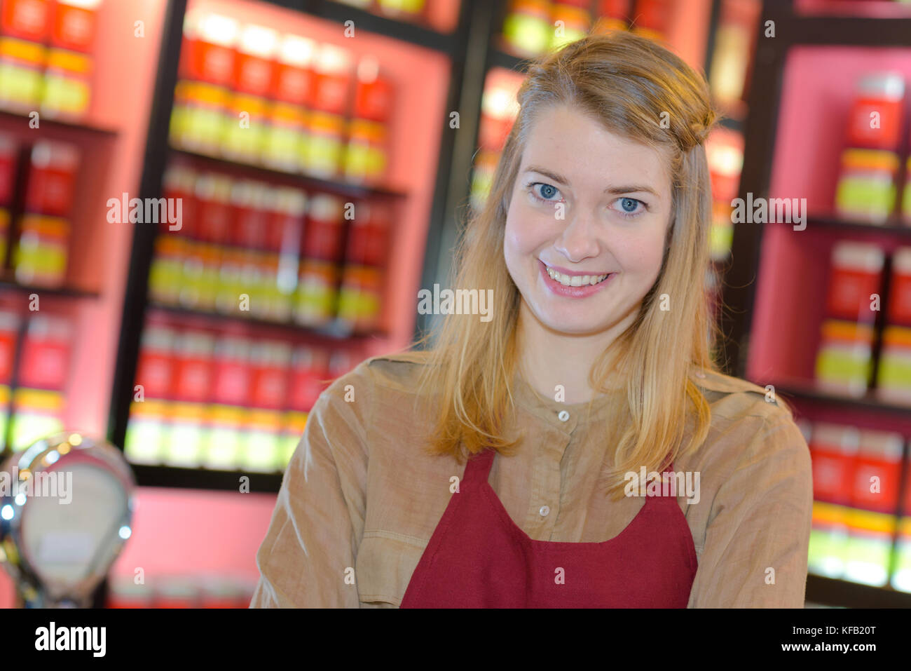 portrait of happy female seller in pharmaceutical store Stock Photo - Alamy