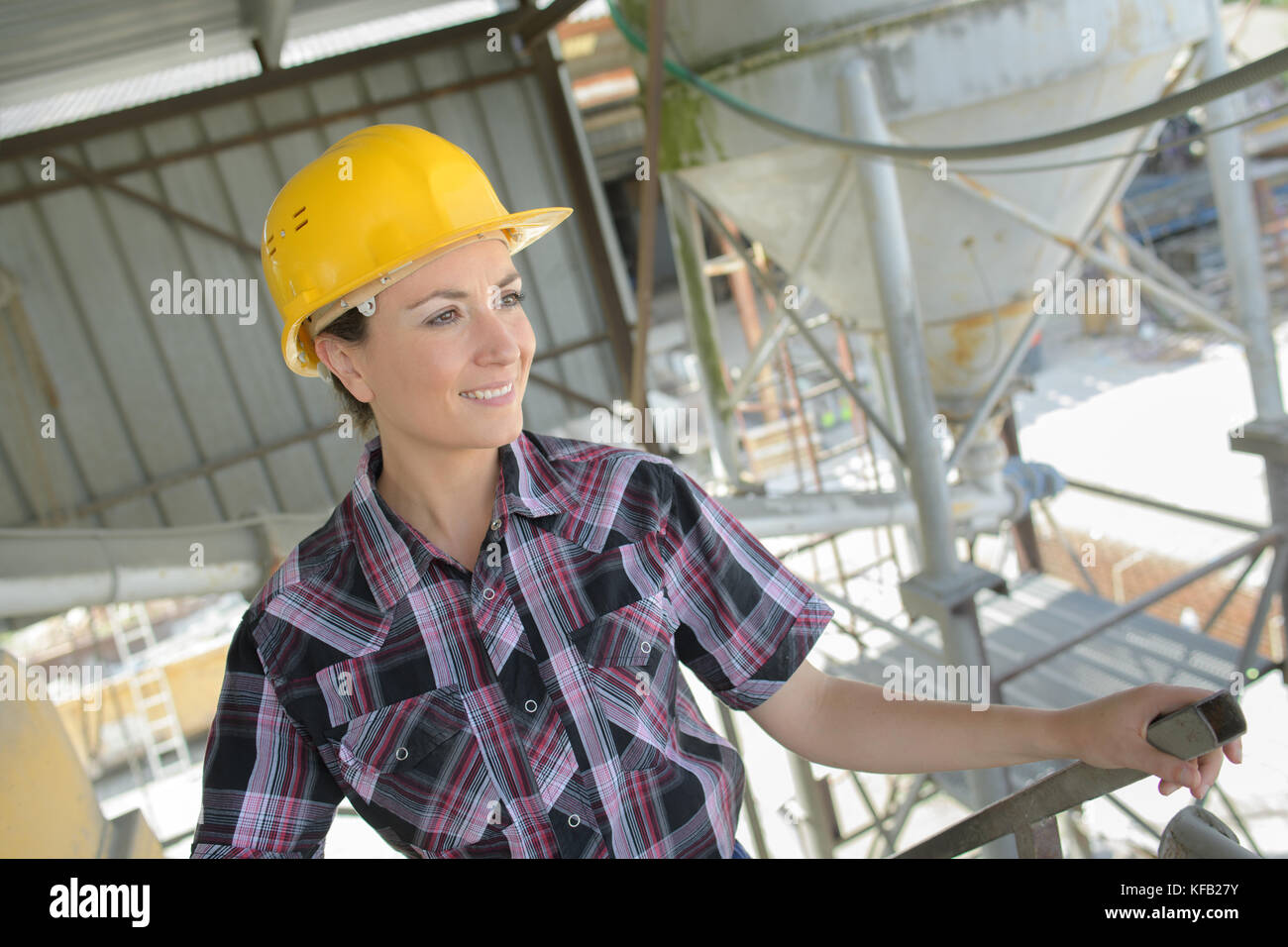 portrait of happy female construction worker at site Stock Photo - Alamy