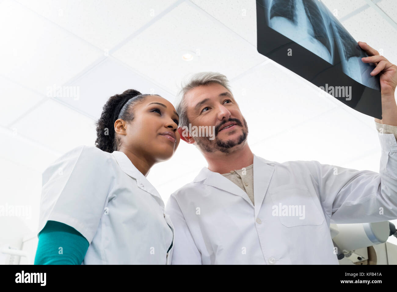 Doctors Analyzing Chest X-ray In Examination Room Stock Photo - Alamy