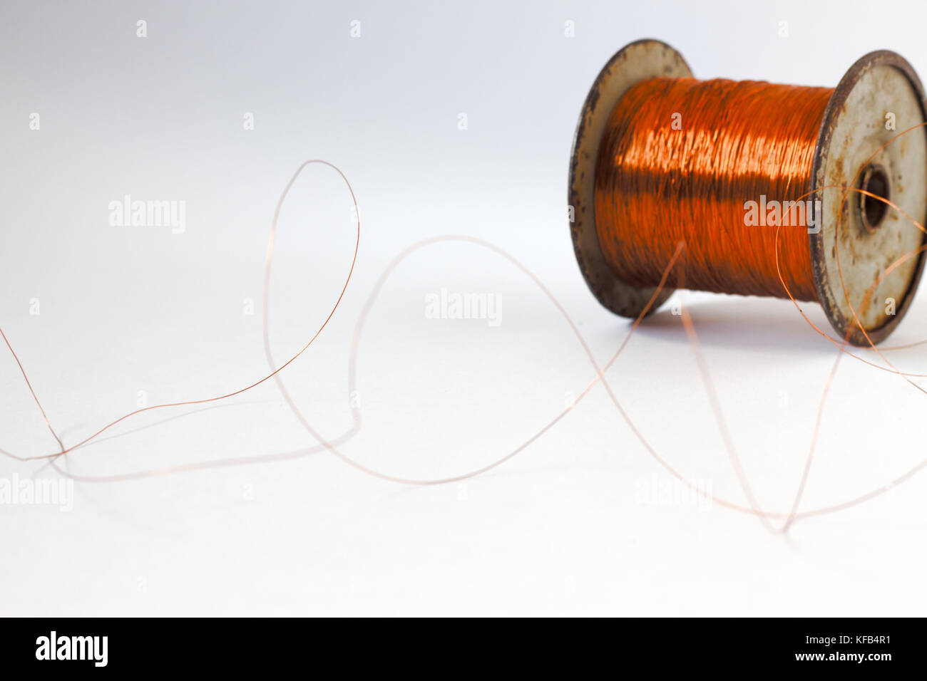 Roll of solder (lead wire) on the white background Stock Photo - Alamy