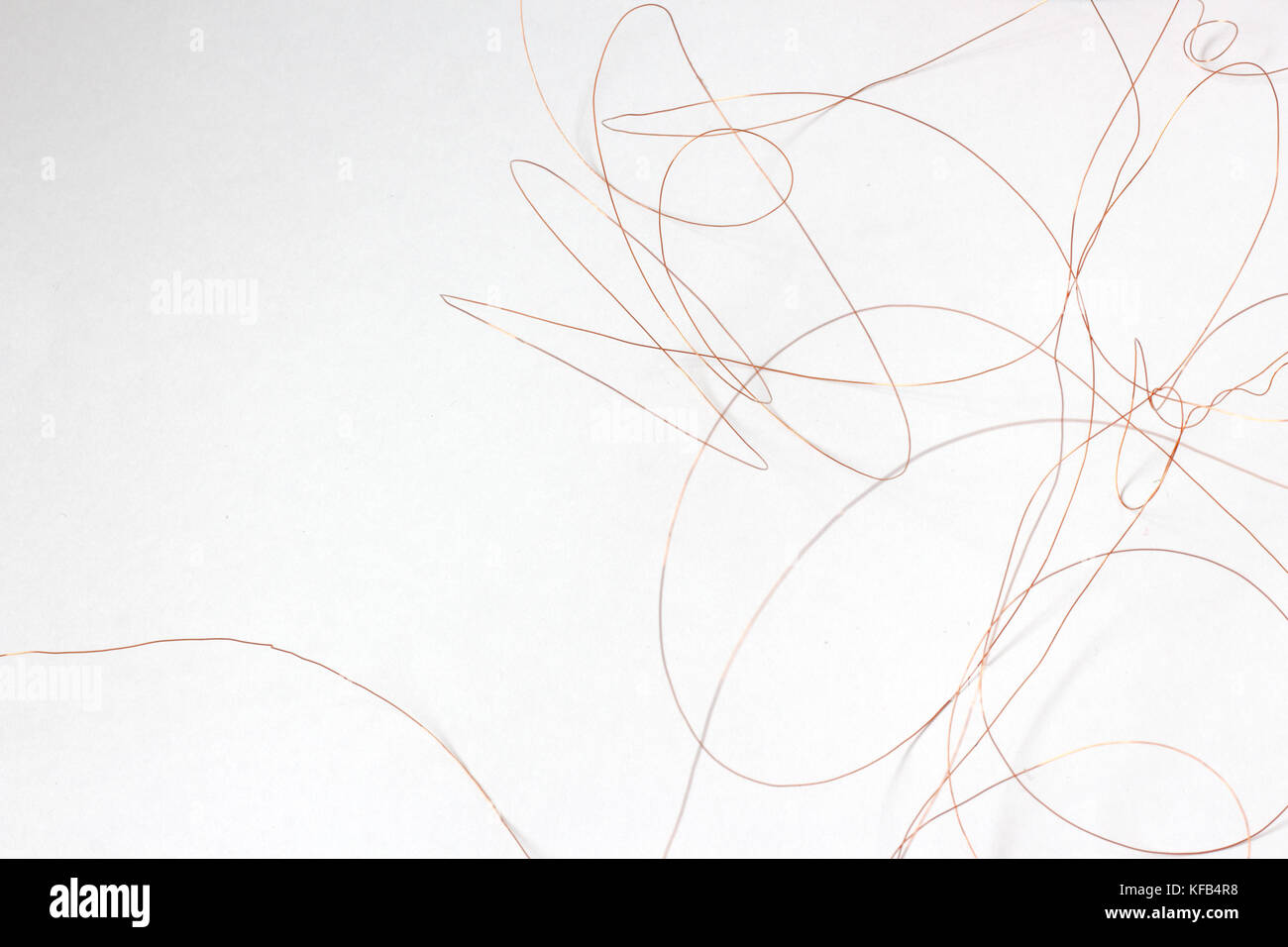 thin wire on white background Stock Photo - Alamy