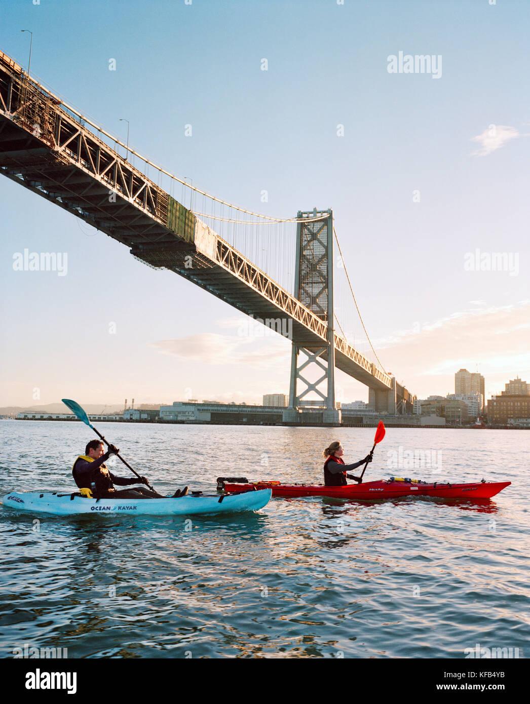 USA, California, San Francisco, a man and woman kayak in the San ...