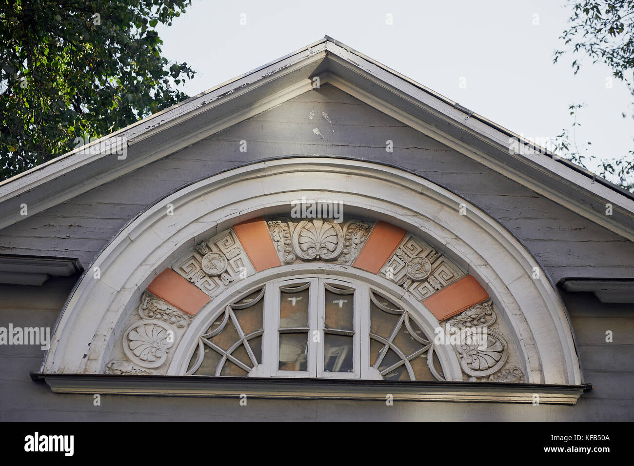Old rounded window in the old wooden house.Architecture Stock Photo - Alamy