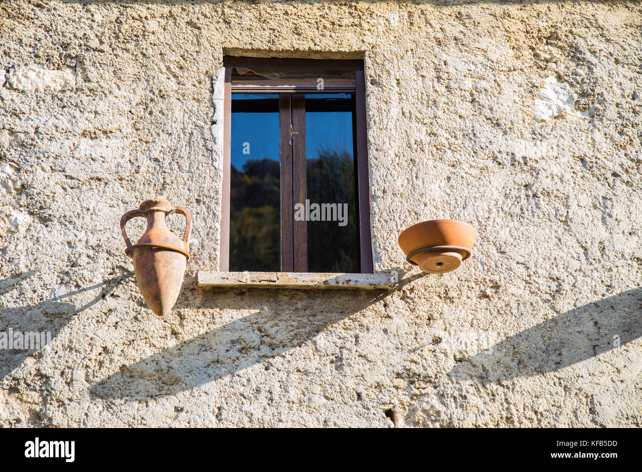 Old closed window with pitcher and bowl outside Stock Photo - Alamy