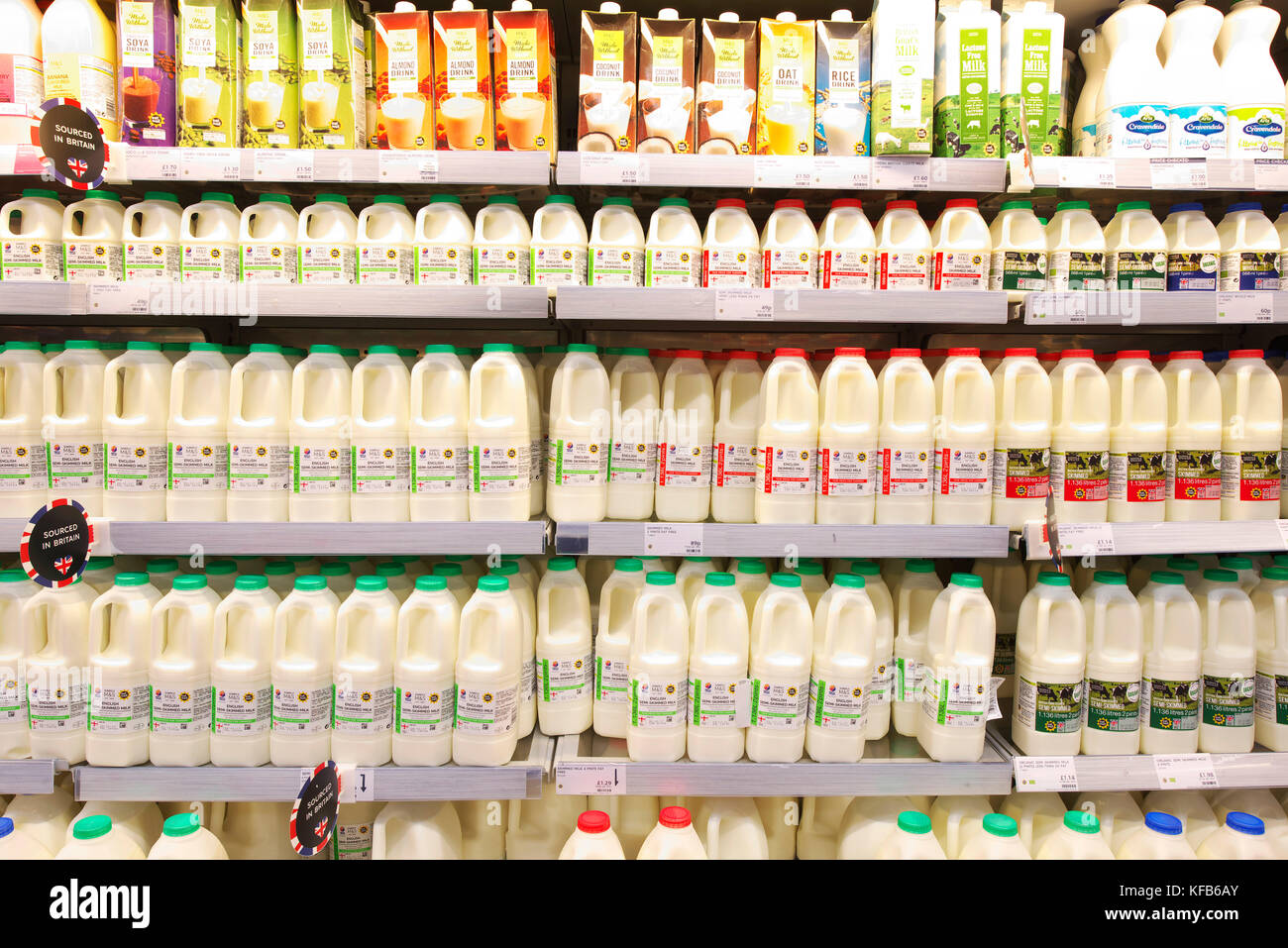 Fresh British milk on the shelves of a marks and spencer foodhall along ...