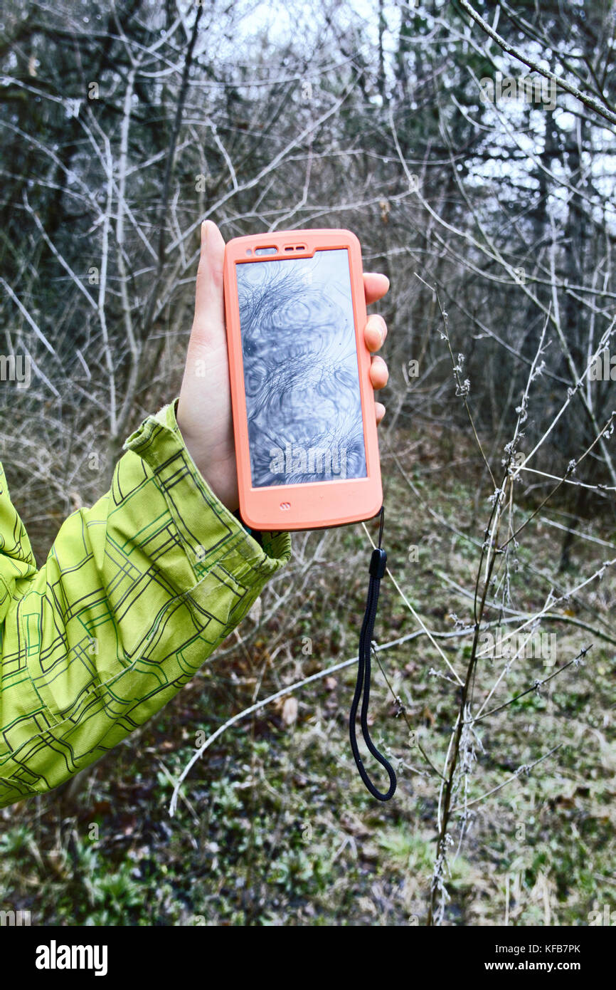Hand gps tracking device forest hi-res stock photography and images - Alamy