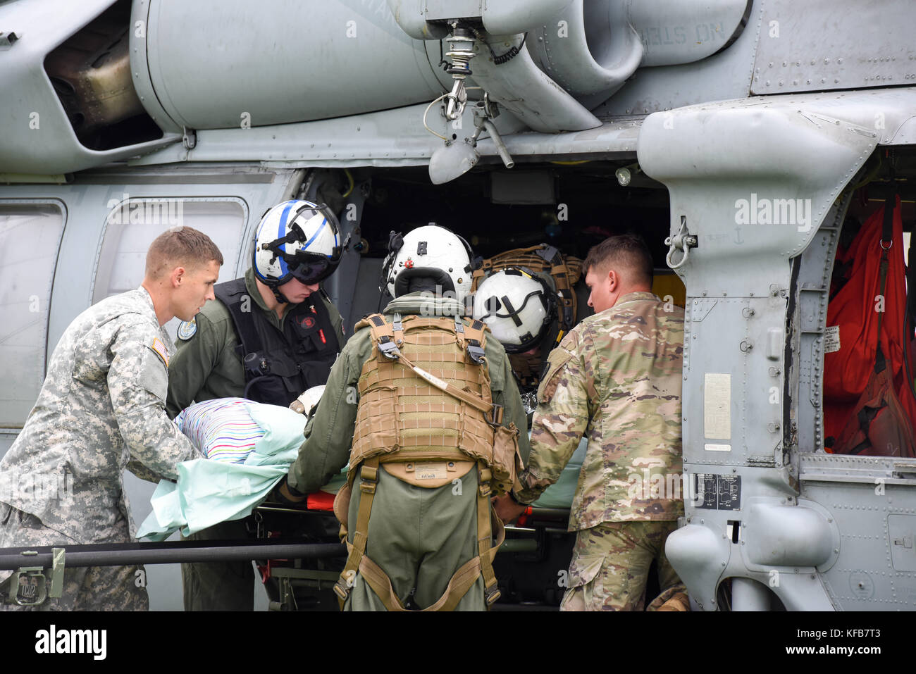 U.S. soldiers transport injured Puerto Rican residents from the 14th ...