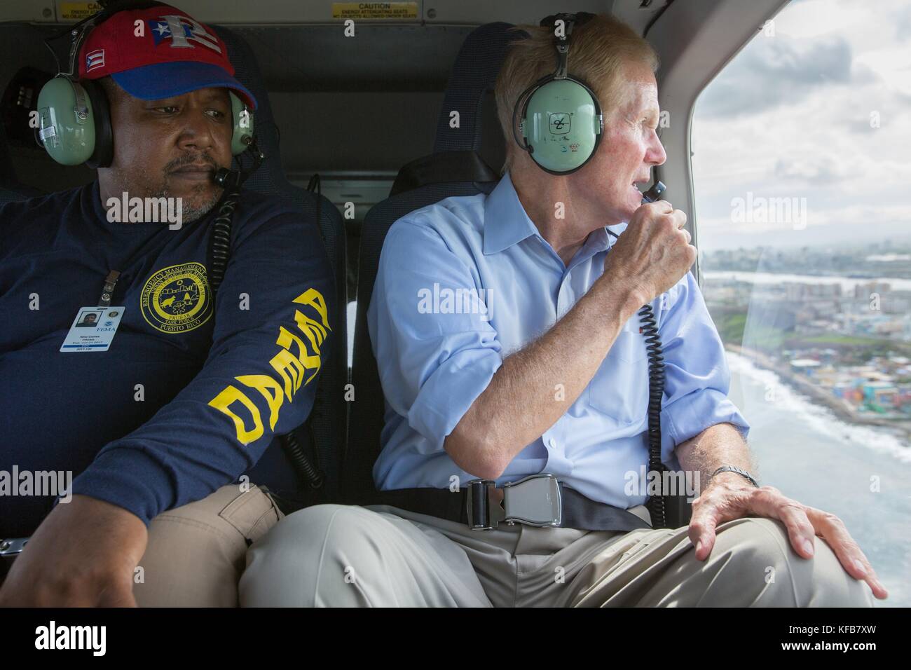 Puerto Rican Urban Search and Rescue Director Nino Correa (left) and U ...