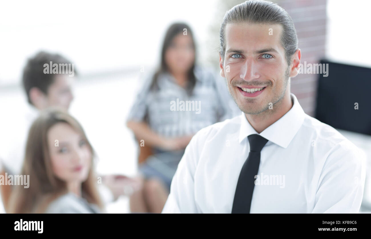 successful young business men on blurred background.photo with copy ...