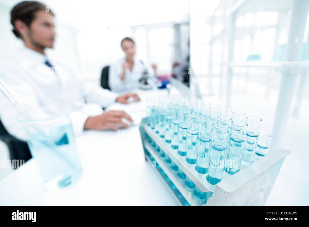 side view of scientists working in laboratory Stock Photo - Alamy
