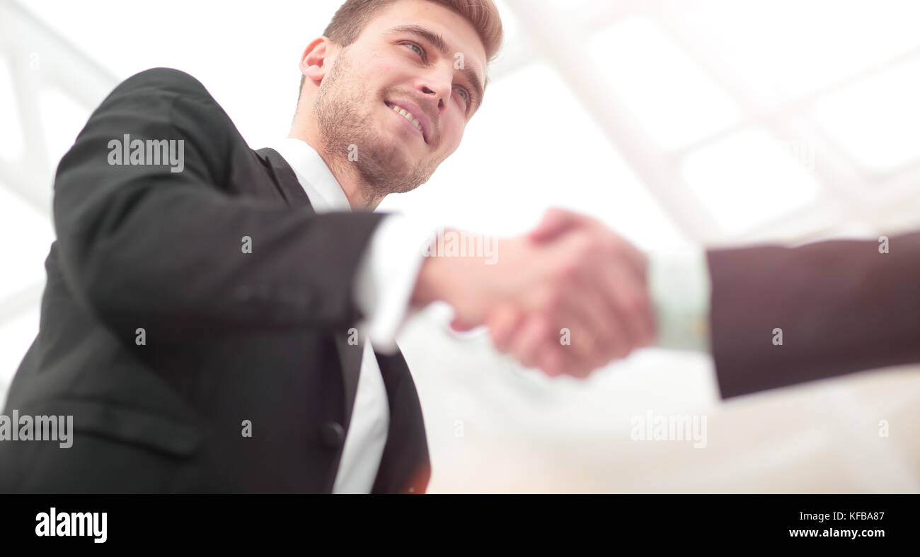 Closeup of handshake as a sign of successful cooperation and interest ...