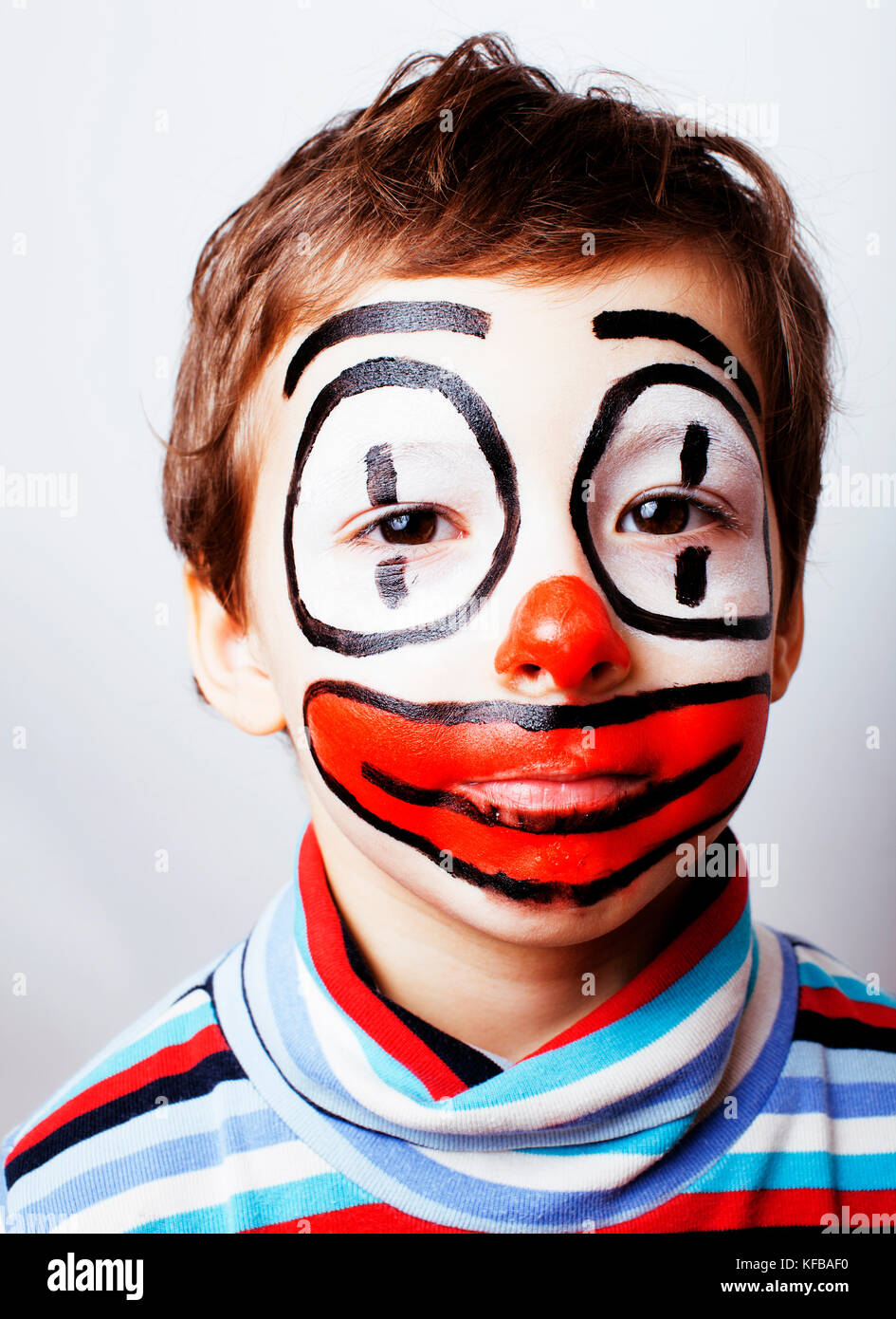 little cute boy with facepaint like clown, pantomimic expression Stock ...