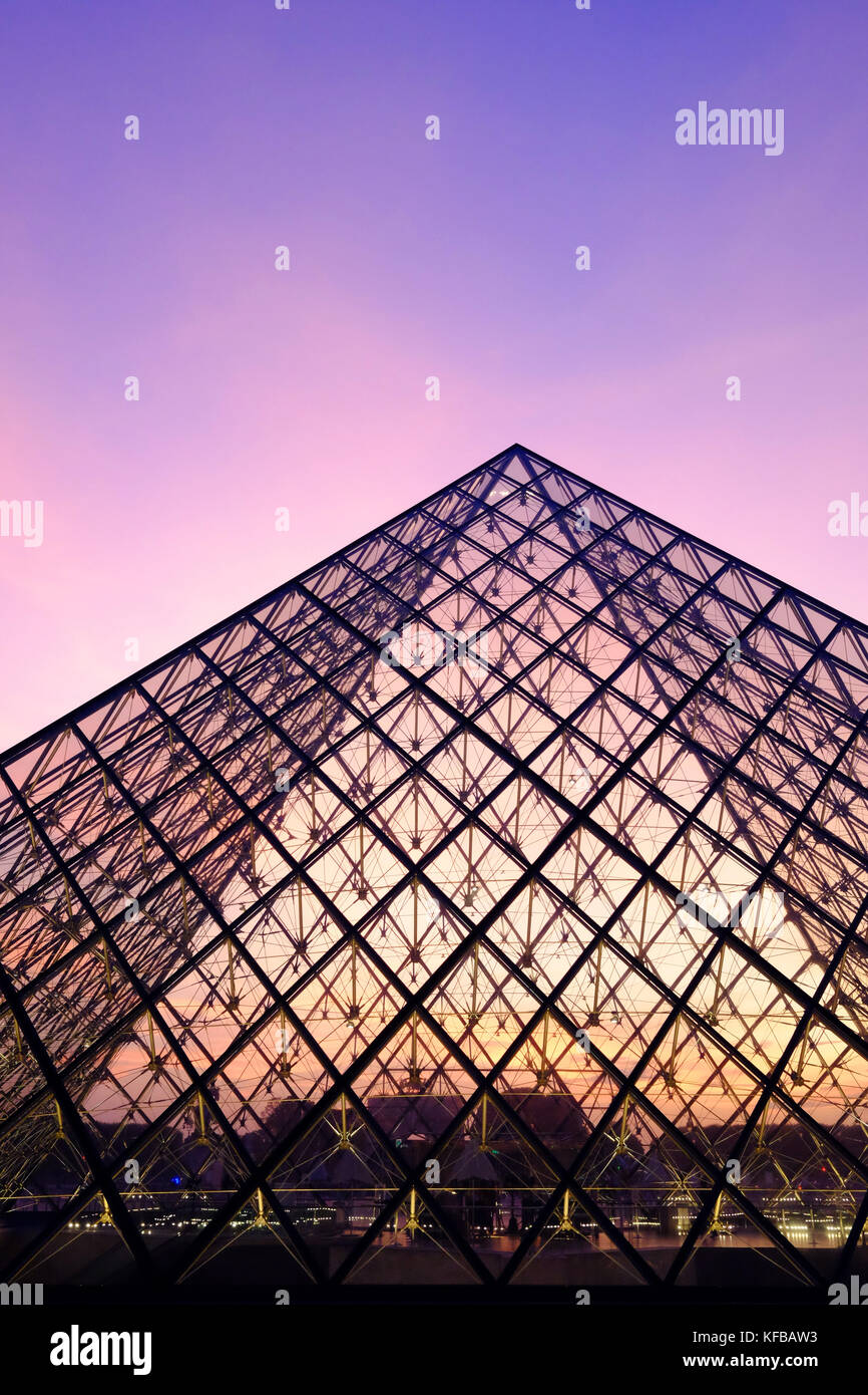 The pyramid of the Louvre in Paris, France at sunset on a summer ...