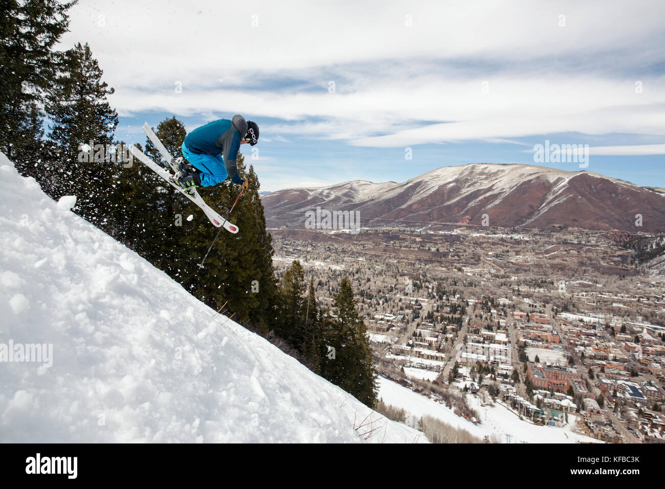 USA, Colorado, Aspen, skier getting air on a trail called Corkscrew ...