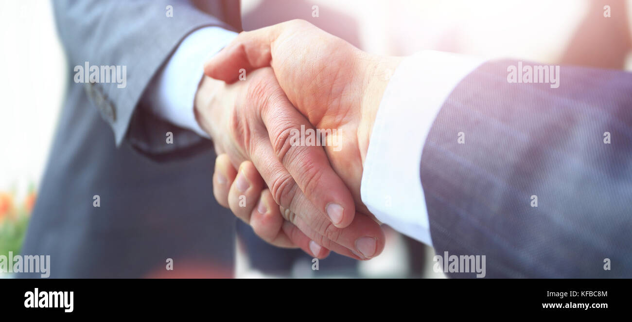 concept of cooperation.businessman handshake invites to cooperat Stock ...