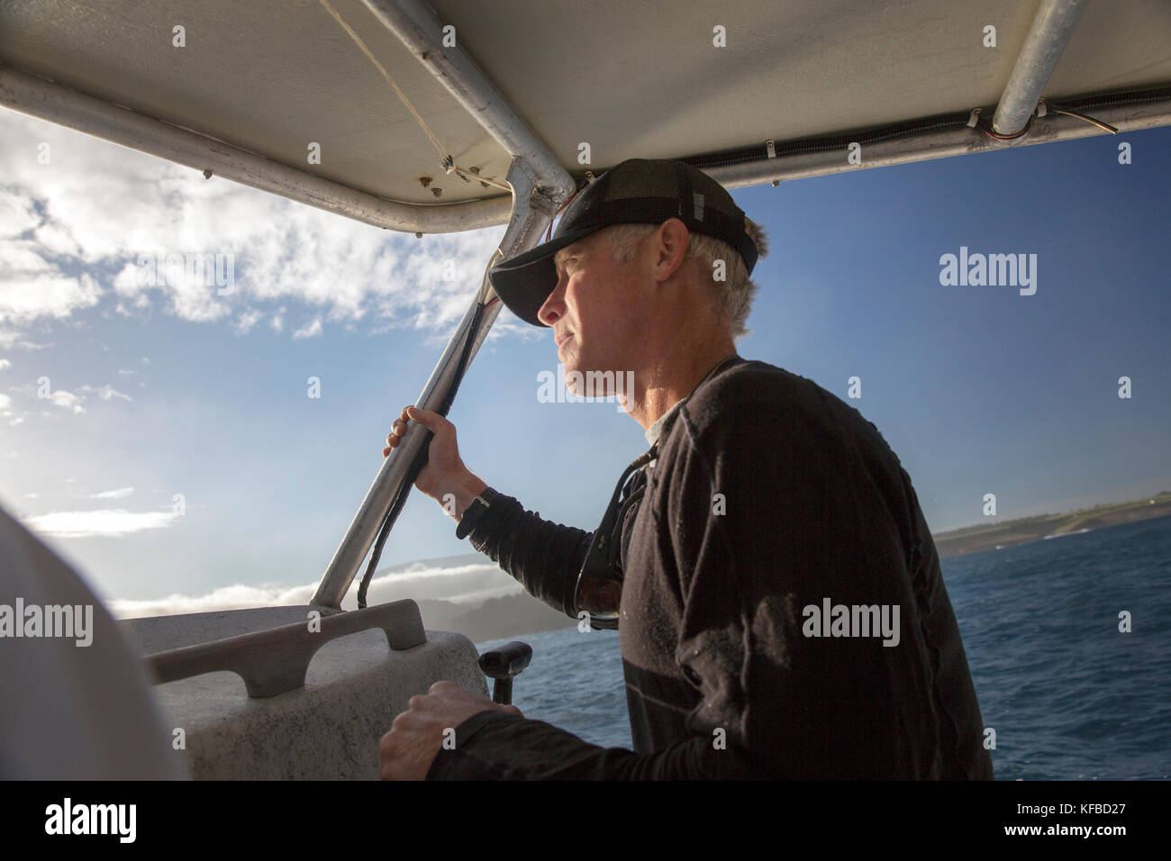 USA, HAWAII, Maui, Jaws, surfers heading out on the boat to Peahi on ...