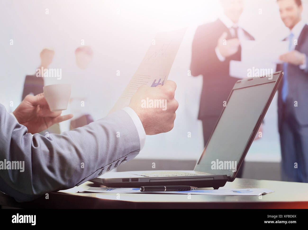 Businessman working in the office. early in the morning Stock Photo - Alamy