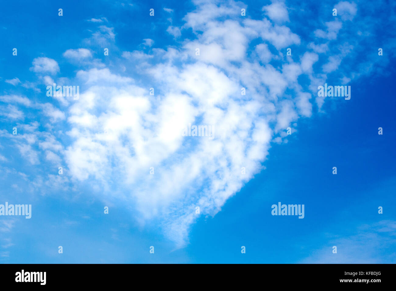 Heart shape clouds on a sunny day Stock Photo - Alamy