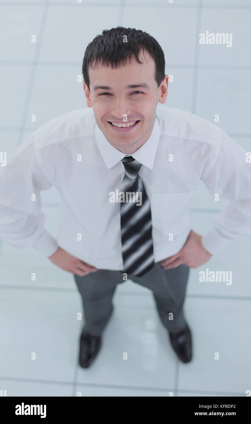 Happy middle aged man standing on isolated white background Stock Photo ...