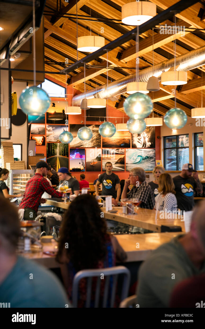 USA, Oregon, Bend, Pacific Pizza and Brew, people enjoying restaurant ...