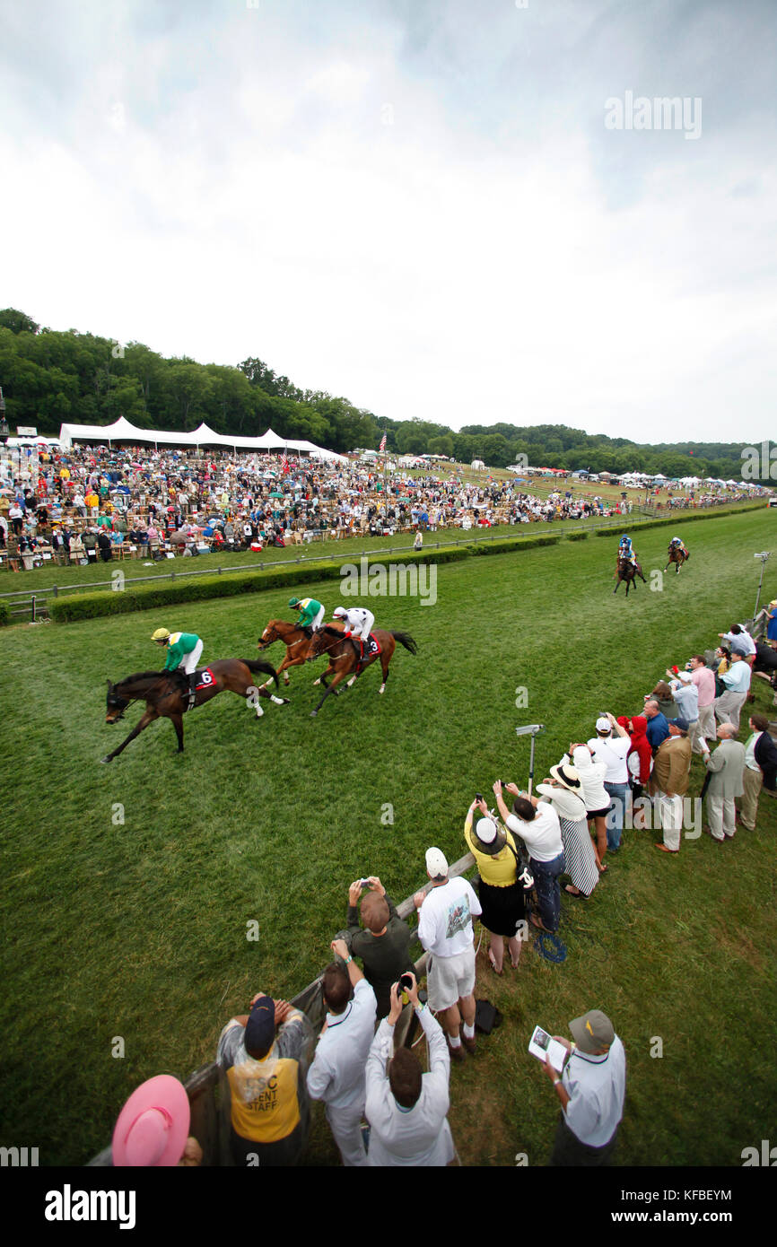 USA, Tennessee, Nashville, Iroquois Steeplechase, horses pass under the ...