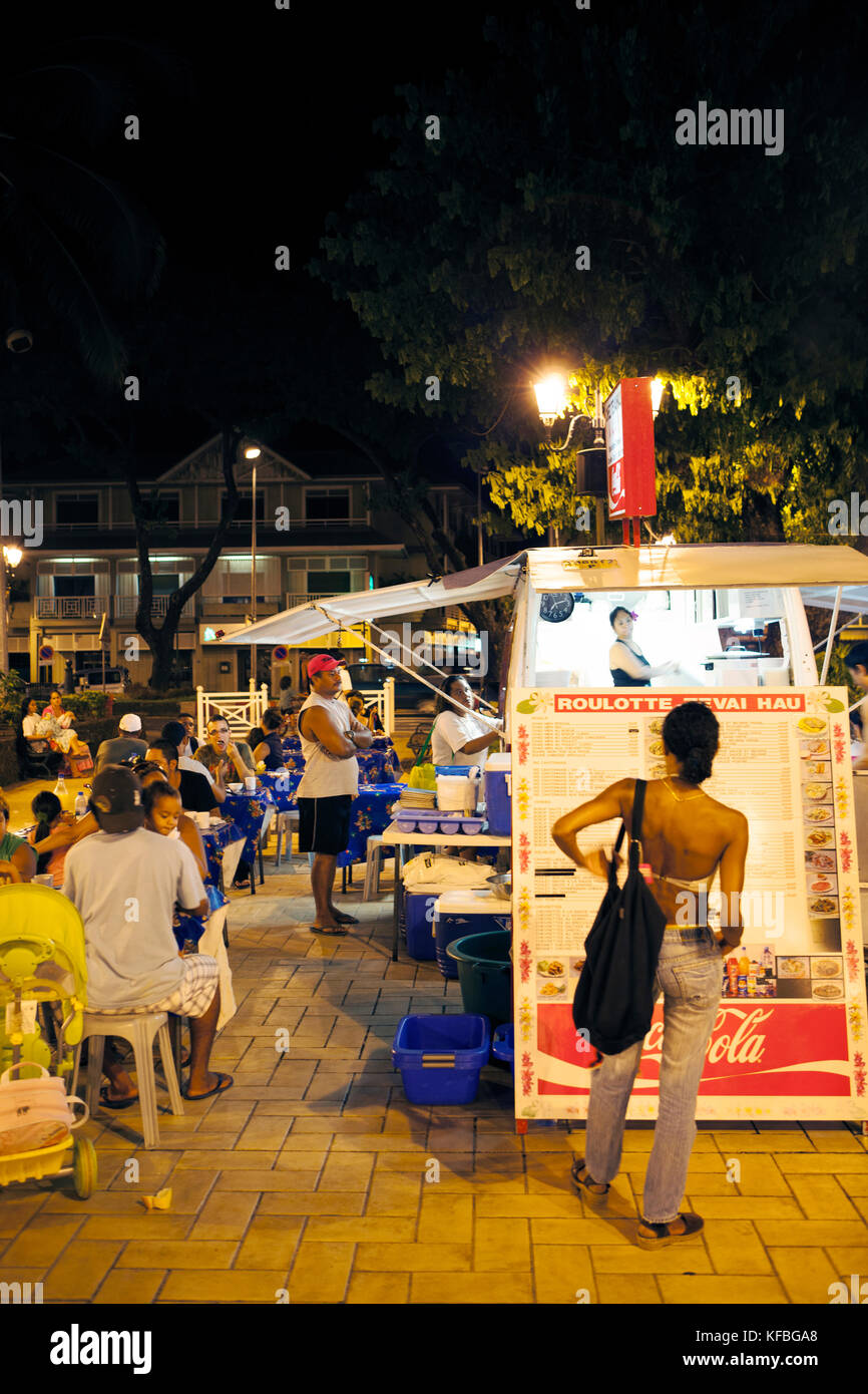 FRENCH POLYNESIA, Tahiti. Roulotte Food Trucks at night at the dock in ...